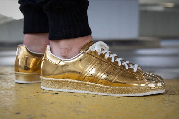 A Golden Take On The Classic adidas Superstar - SneakerNews.com