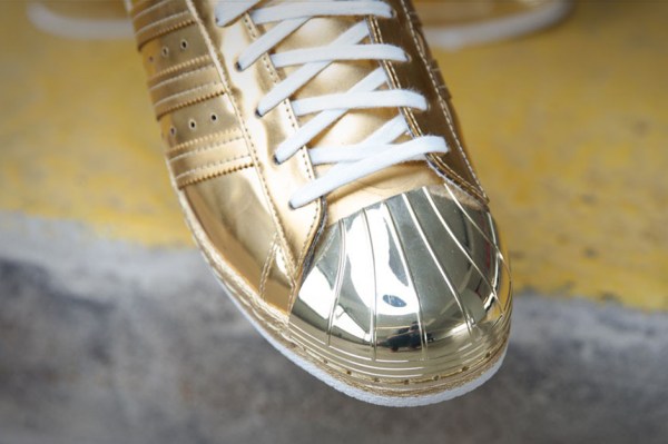 A Golden Take On The Classic adidas Superstar - SneakerNews.com