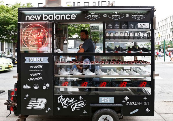 New Balance 574 Sport Coffee Cart NYC | SneakerNews.com