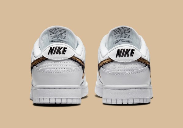 Nike Dunk Low WMNS Animal Print DD7099-100 | SneakerNews.com
