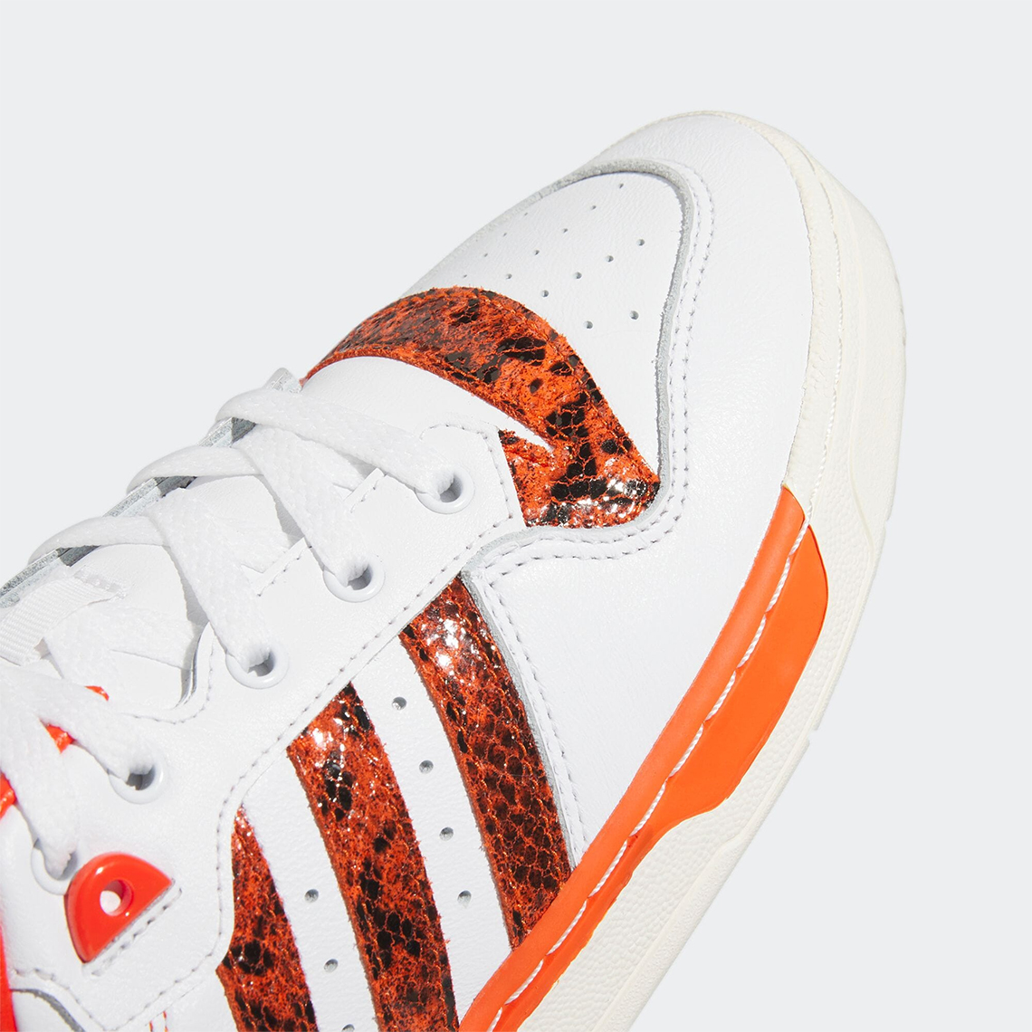 adidas Rivalry Lo "Orange Snakeskin" HP9048 | SneakerNews.com