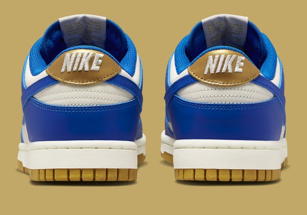 Nike Dunk Low Royal Blue Gold FB7173-141 | SneakerNews.com