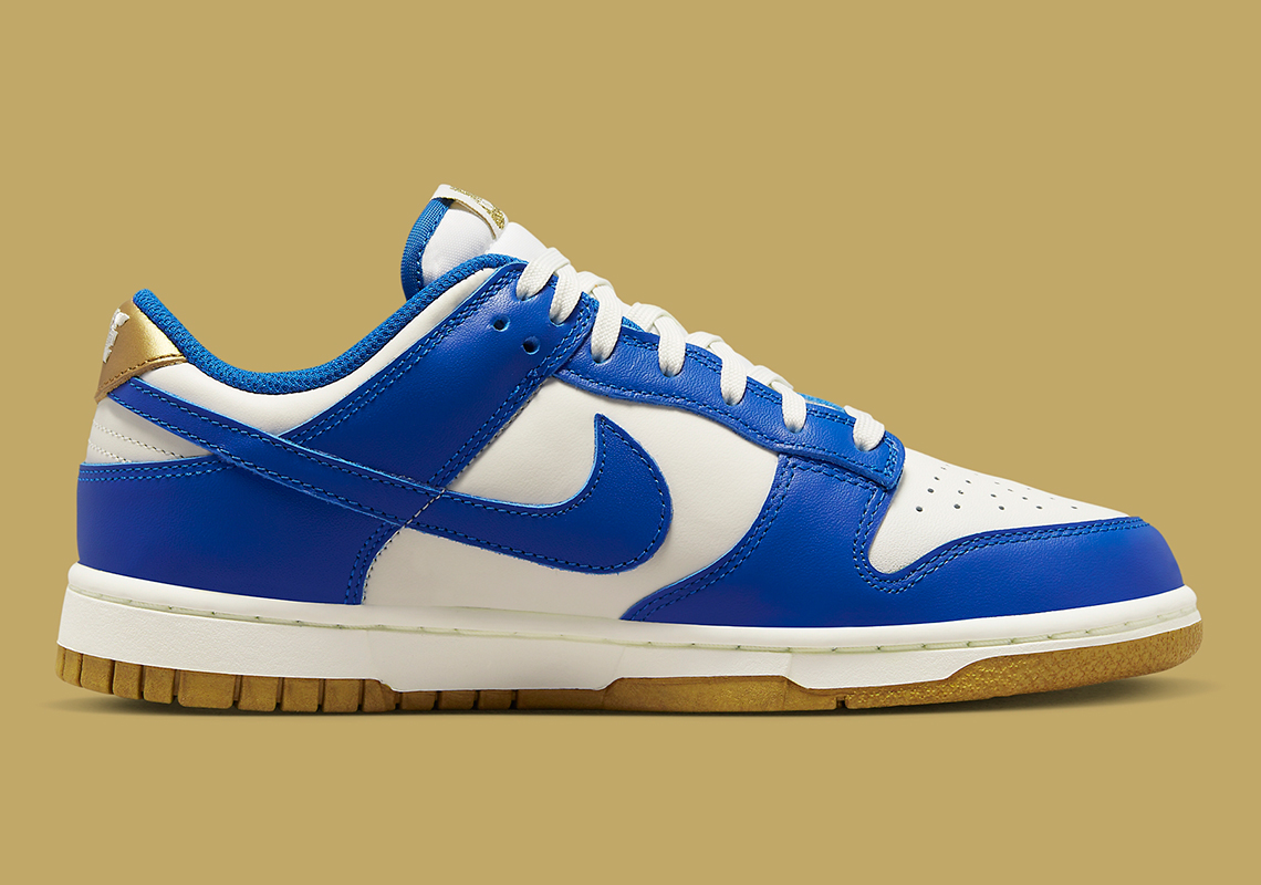Nike Dunk Low Royal Blue Gold FB7173-141 | SneakerNews.com