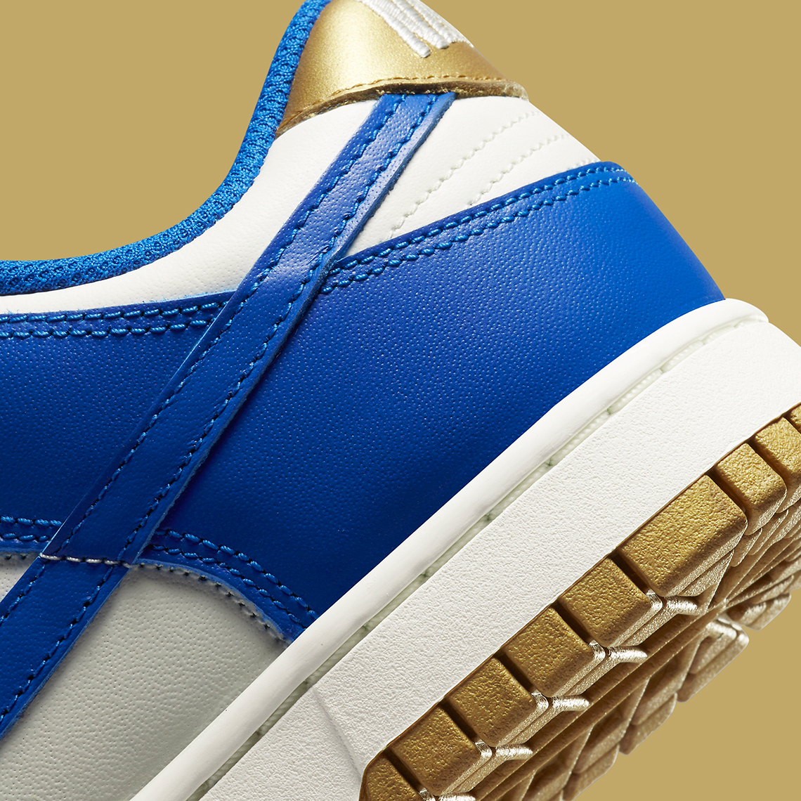 Nike Dunk Low Royal Blue Gold FB7173-141 | SneakerNews.com