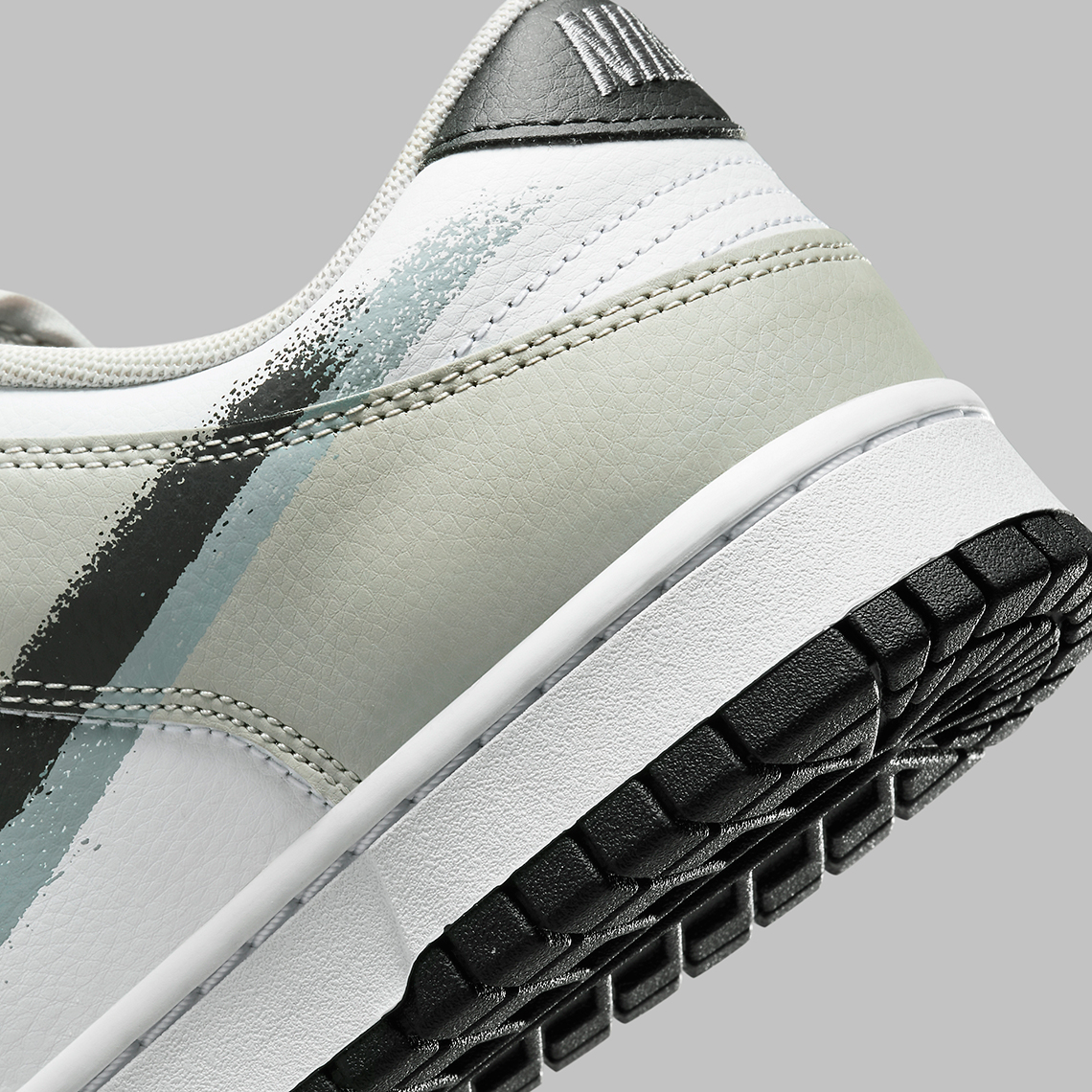 Nike Dunk Low "Stencil Swoosh" FD0661-100 | SneakerNews.com