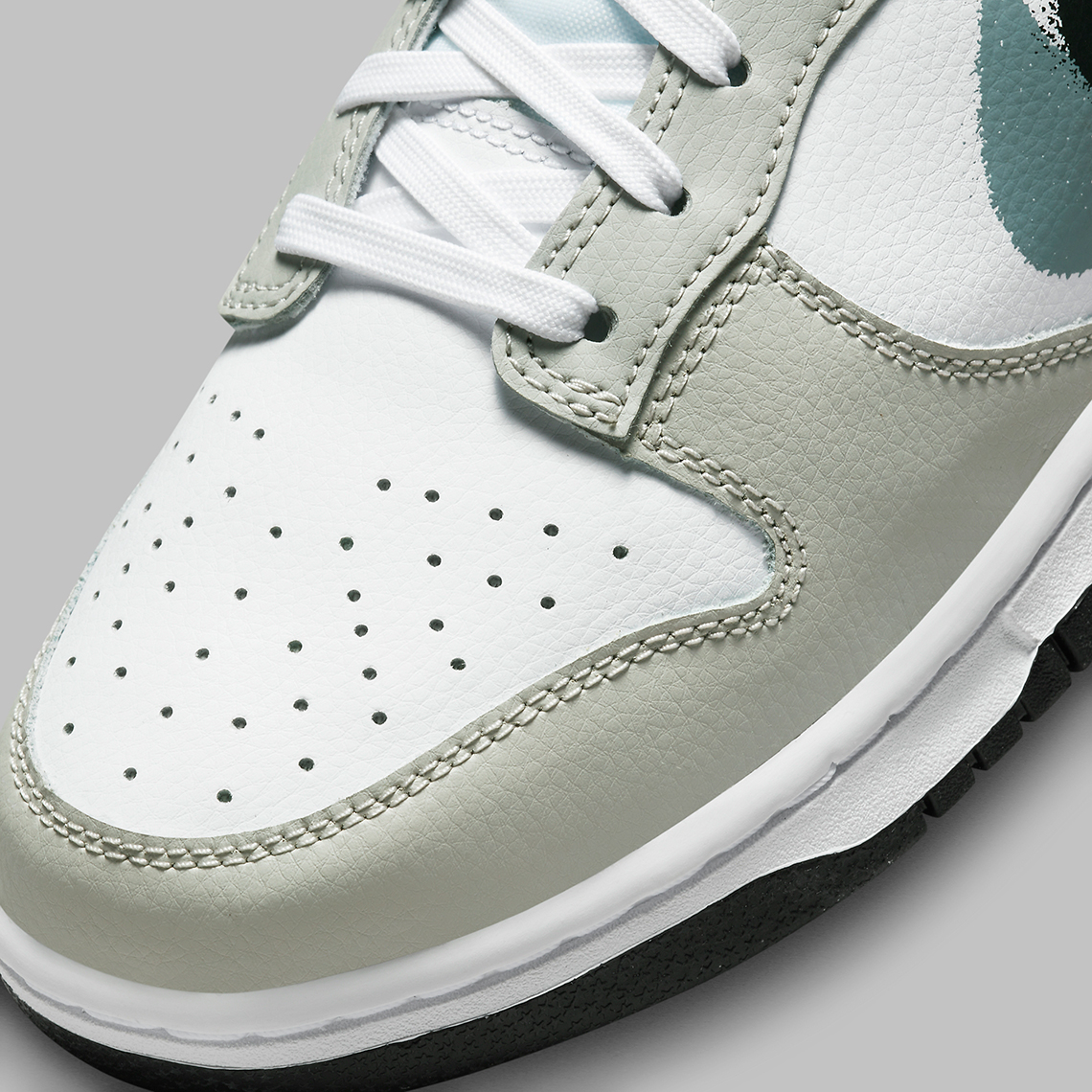 Nike Dunk Low "Stencil Swoosh" FD0661-100 | SneakerNews.com