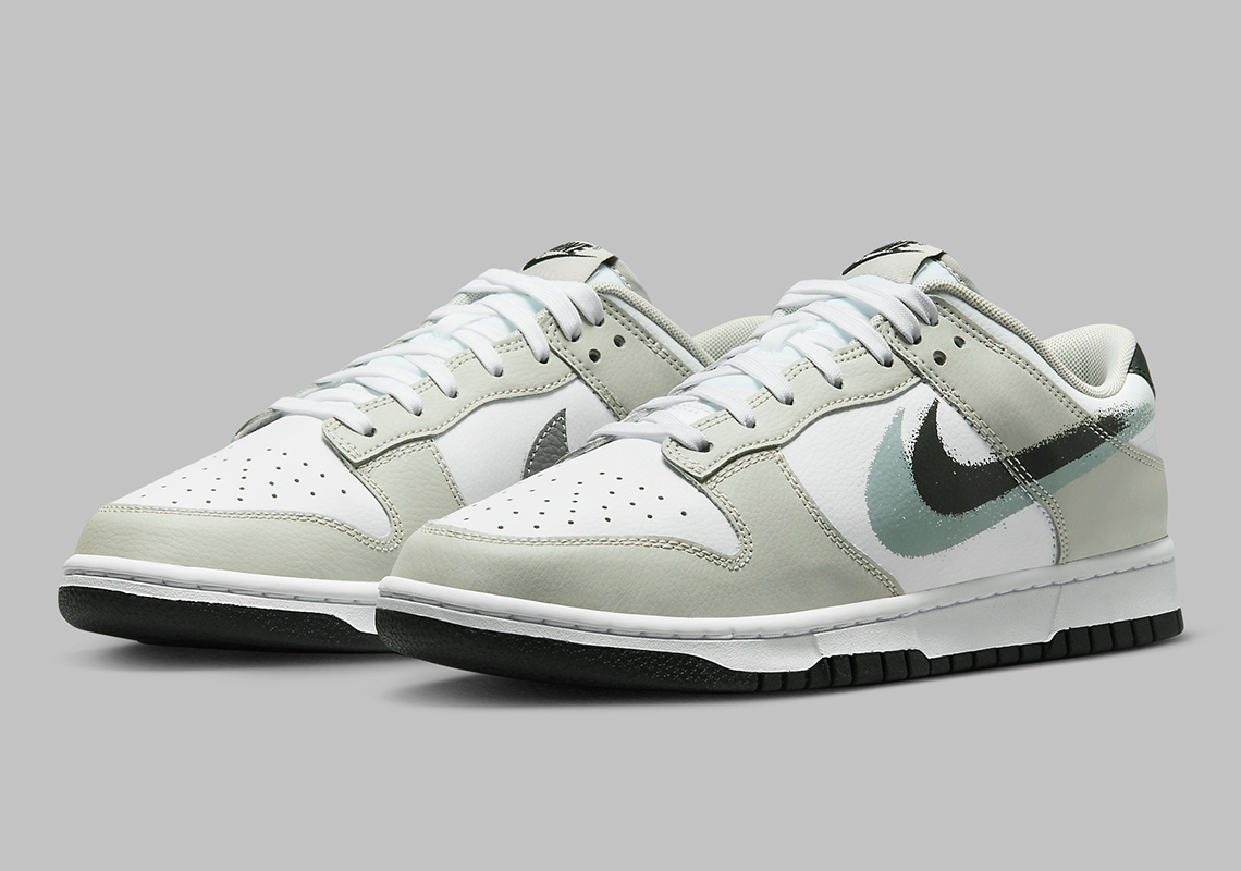 Nike Dunk Low "Stencil Swoosh" FD0661-100 | SneakerNews.com