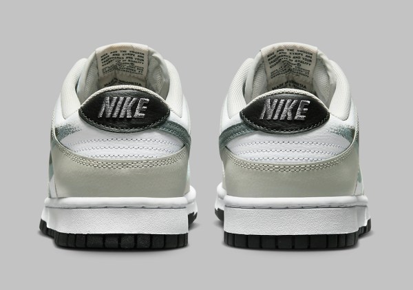 Nike Dunk Low "Stencil Swoosh" FD0661-100 | SneakerNews.com