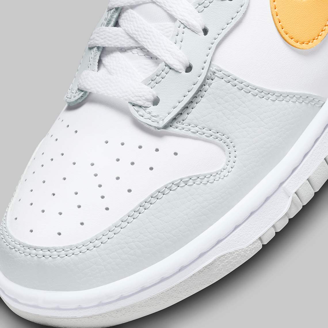 Nike Dunk High Grey Yellow Swoosh Oval | SneakerNews.com