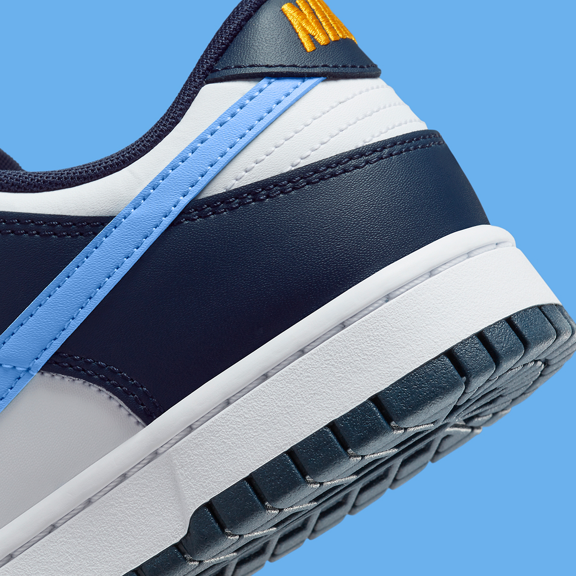 Nike Dunk Low Obsidian University Blue Orange FN7800-400 | SneakerNews.com