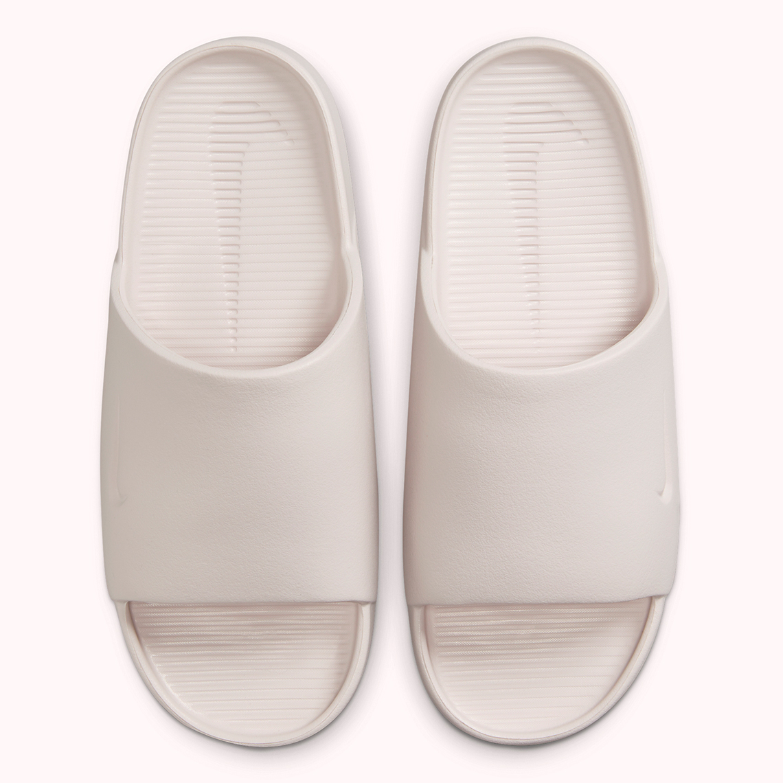 Nike Calm Slide Light Soft Pink DX4816-600 | SneakerNews.com