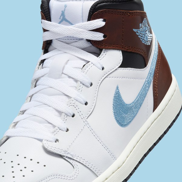 Embroidered Swoosh Leads An Upscale Air Jordan 1 Mid SE - SneakerNews.com