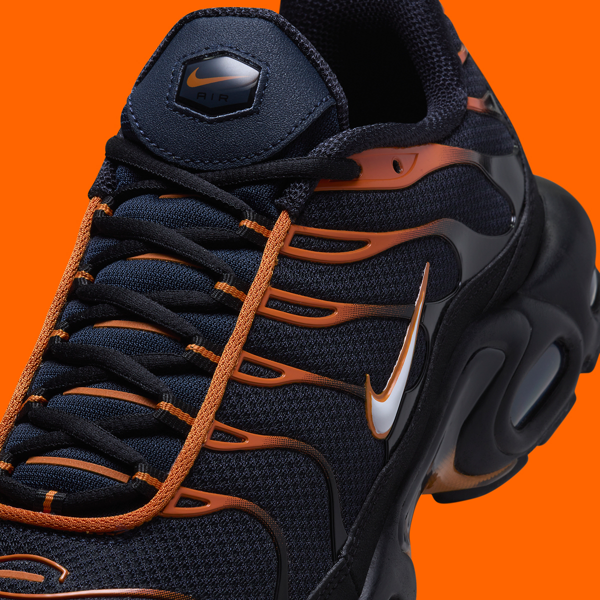 Nike Air Max Plus "Dark Obsidian/Orange" FN6949-400 | SneakerNews.com
