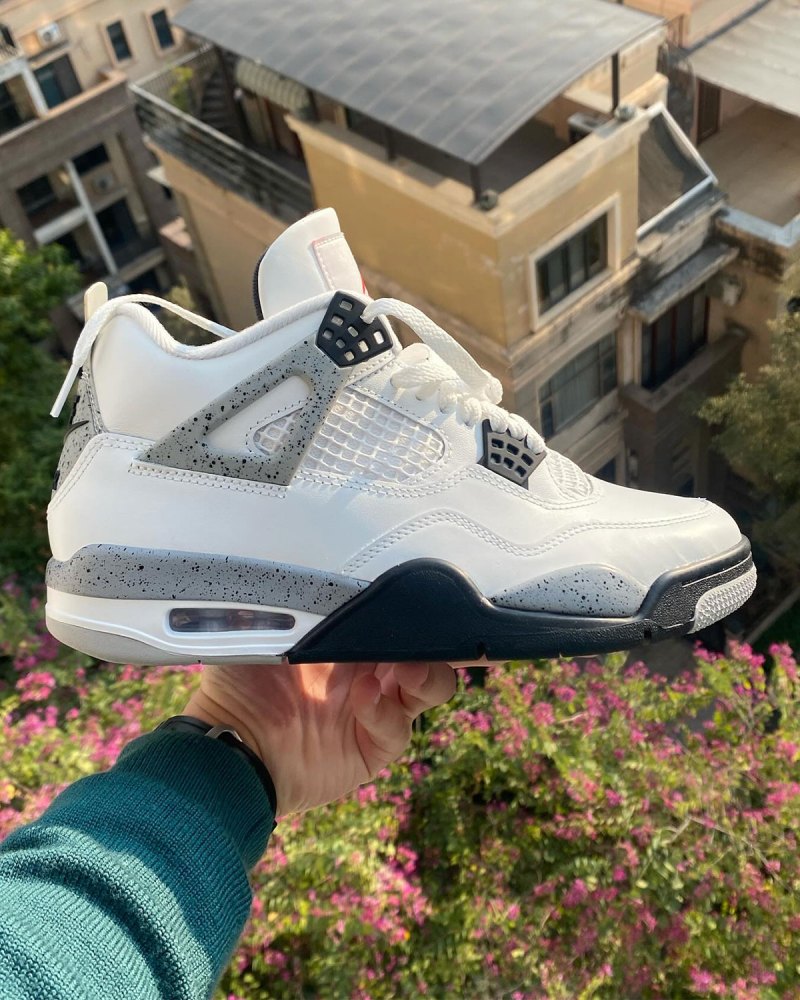 Air Jordan 4 "White Cement" 2025 First Look | SneakerNews.com