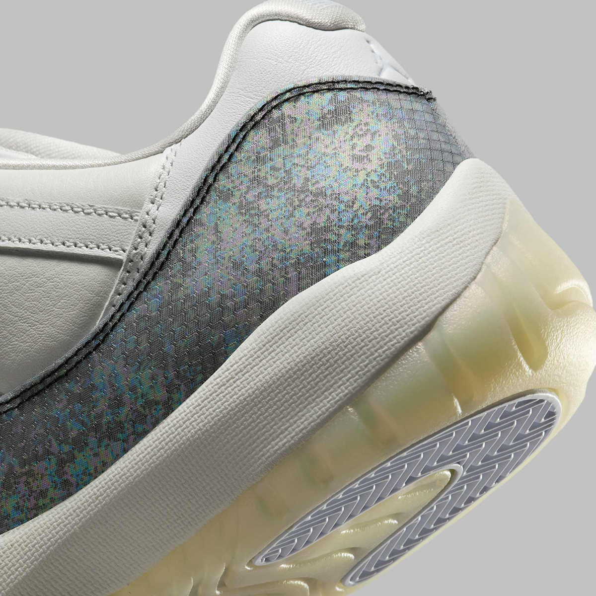 Year Of The Snake Jordan 11 Low HQ7000-001 SneakerNews.com