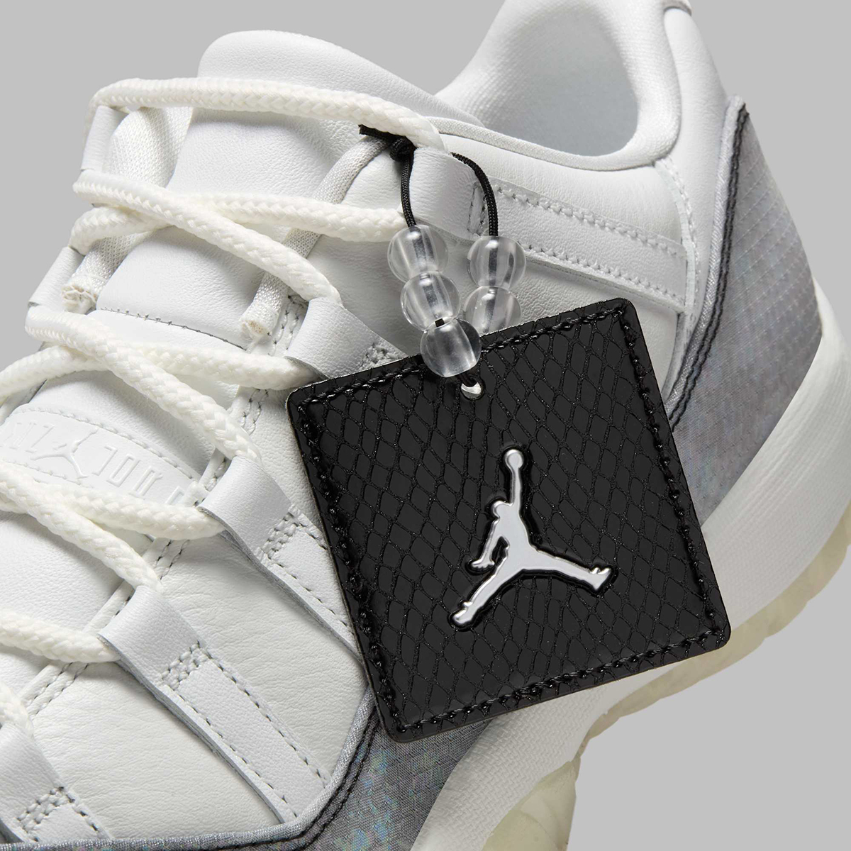 Year Of The Snake Jordan 11 Low HQ7000-001 SneakerNews.com