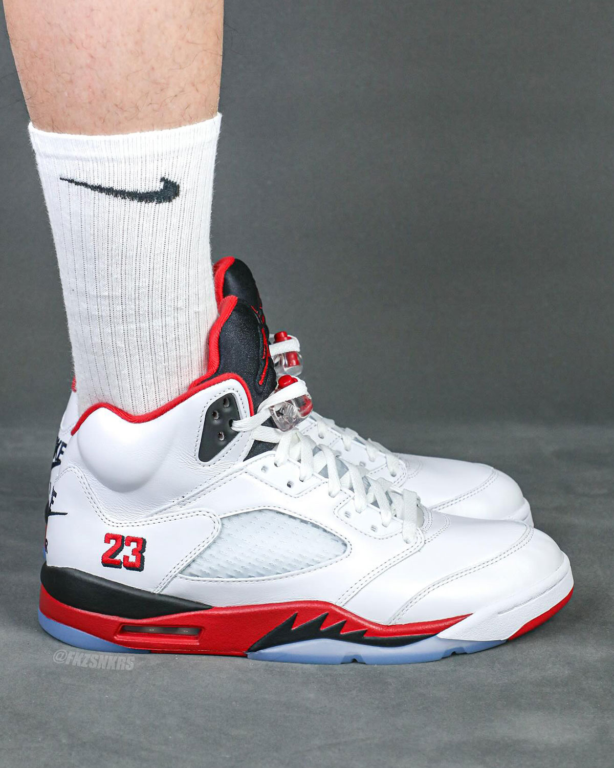 Fire Red Jordan 5 Black Tongue HQ7978-101 | SneakerNews.com
