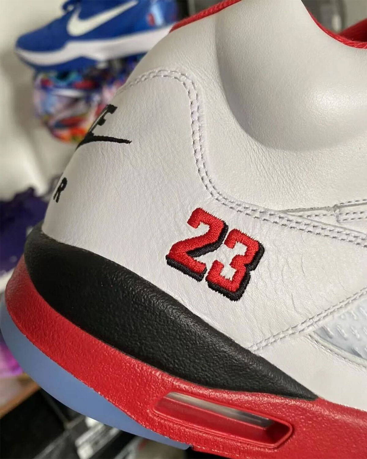Fire Red Jordan 5 Black Tongue HQ7978-101 | SneakerNews.com