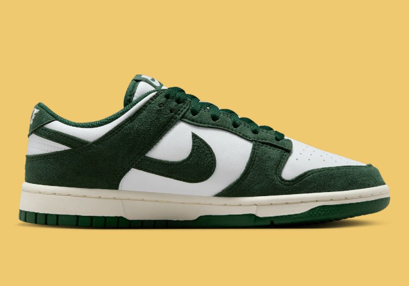 Nike Dunk Low Gold Mini Swoosh IB4417-100 | SneakerNews.com