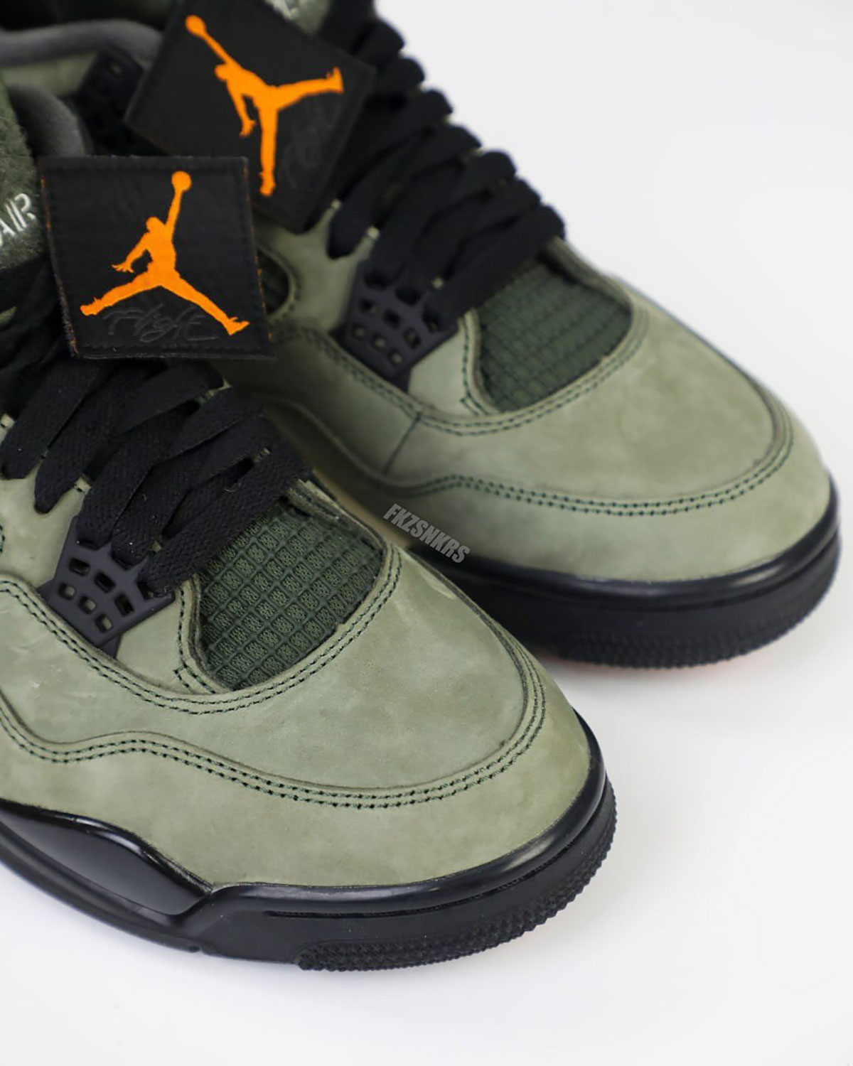 Jordan 4 Undefeated 2025 | SneakerNews.com